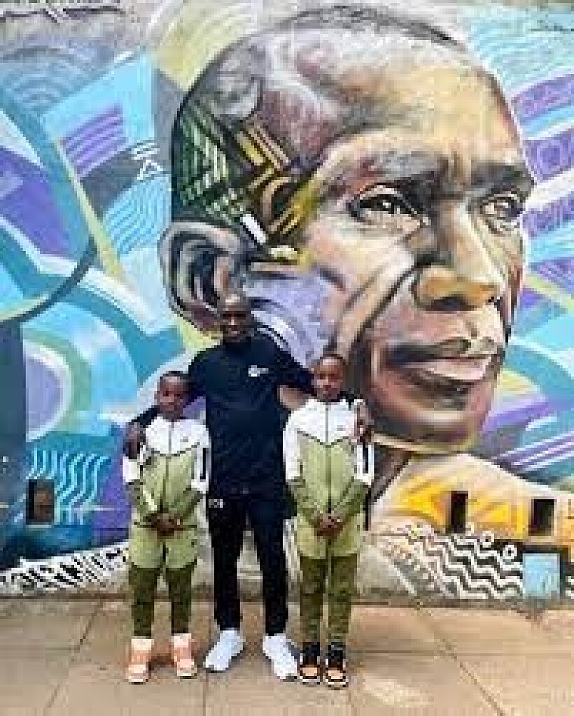Kenyan graffiti artist Bankslave creates a mural for the GOAT in ...